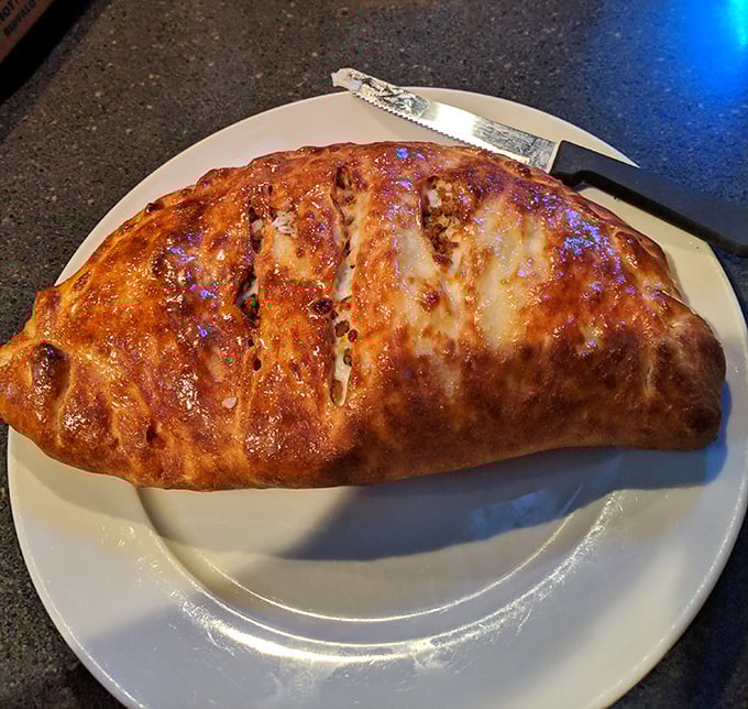 Behold the legendary sausage roll in all its golden-brown glory – architecture so perfect it deserves its own area code.