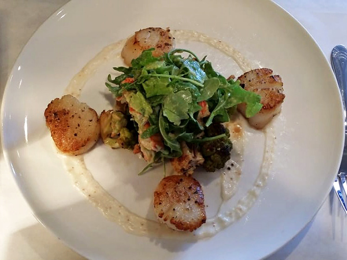These perfectly seared scallops might make you forget your table manners. Golden exteriors, tender centers—the reason Pennsylvania license plates fill the parking lot.