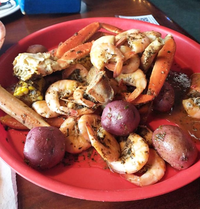 A seafood boil that doesn't mess around – crab legs, shrimp, potatoes, and corn, all seasoned to perfection. This isn't a meal; it's a maritime celebration.