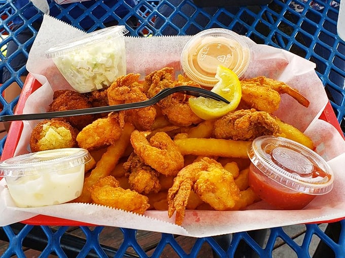 Golden-fried shrimp and fries served in a basket – sometimes the simplest pleasures are the most profound culinary experiences.