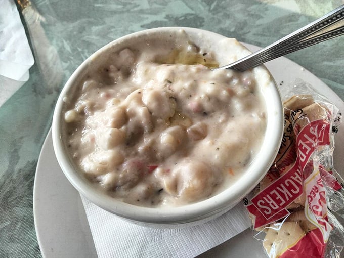 The legendary seafood chowder in all its glory—creamy, chunky, and packed with treasures from the sea that would make Neptune himself jealous.