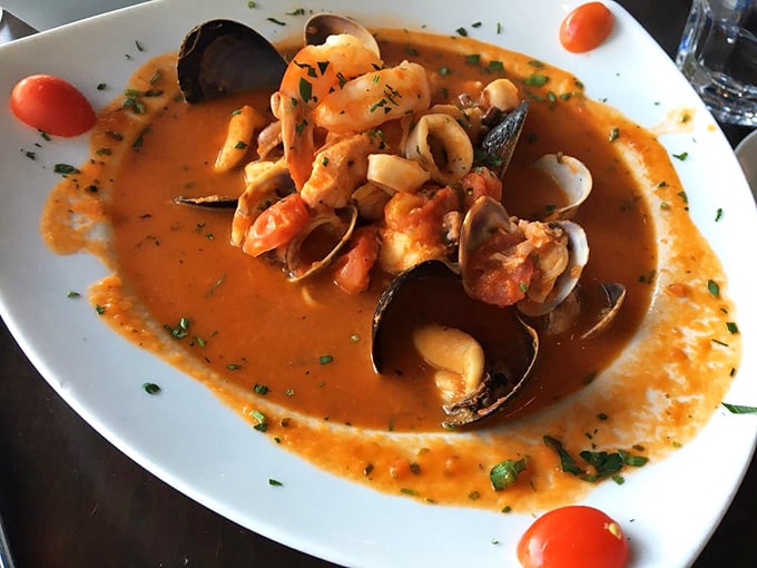 Behold the legendary cioppino—a seafood symphony where each shellfish seems to have been personally invited to the party.