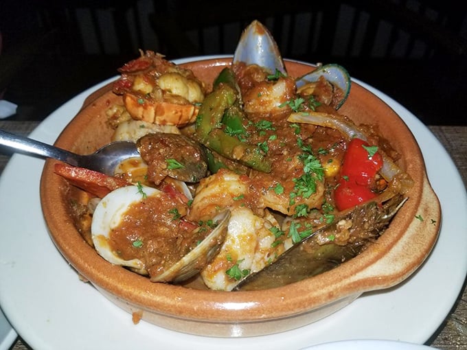 This seafood medley isn't just a dish – it's a spicy, saucy autobiography of the Gulf, telling its delicious life story one shellfish at a time.