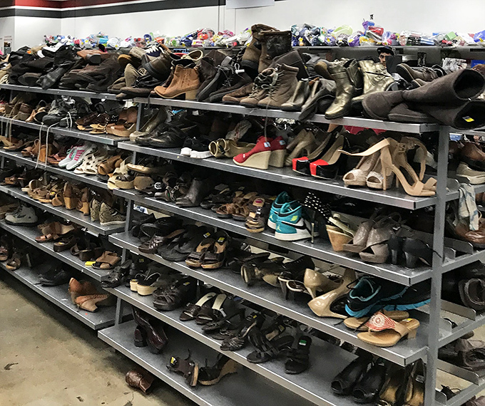 The shoe section resembles an archaeological dig through decades of footwear fashion – each shelf a different stratum of style history.