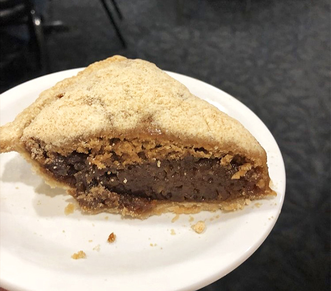 Shoofly pie – where molasses meets crumb topping in a marriage so perfect it should have its own reality show.