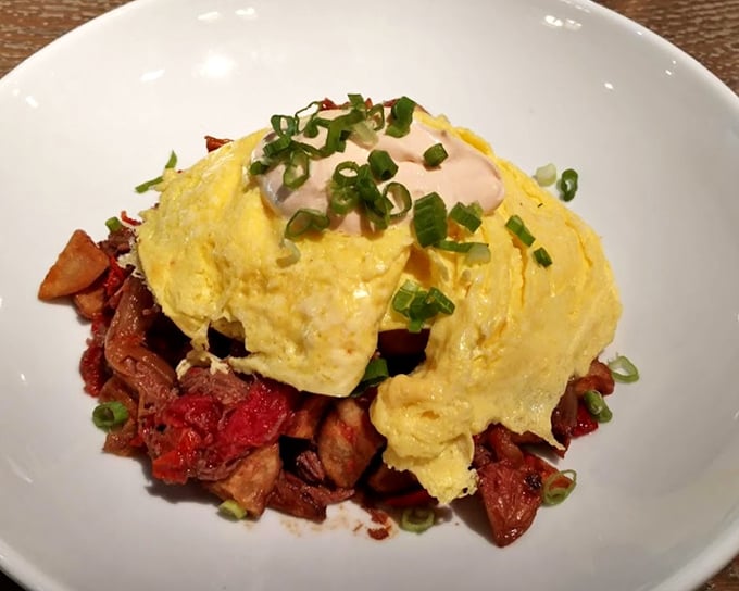 The legendary short rib hash – where tender meat meets crispy potatoes under a perfect egg. This is breakfast nirvana, folks.