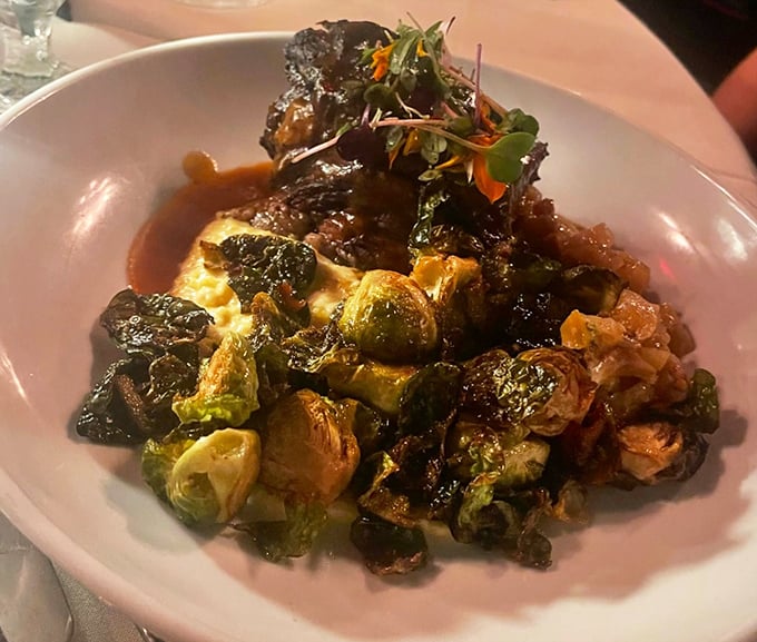 These short ribs don't just fall off the bone—they practically leap onto your fork. Nestled among Brussels sprouts and creamy potatoes, it's comfort food with a PhD.