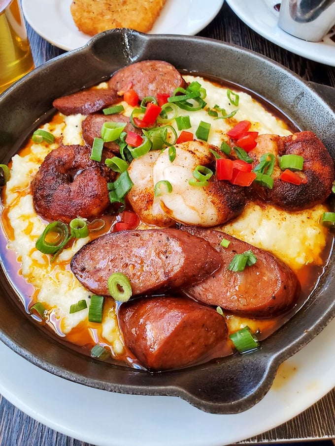 Behold the star attraction: shrimp and grits that would make a Southern grandmother both proud and suspicious. Those perfectly seared shrimp nestled in creamy grits deserve their own fan club.