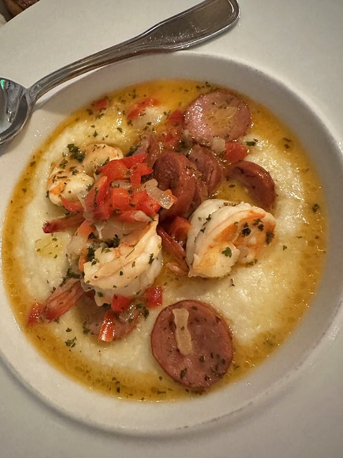 This isn't just shrimp and grits—it's a Southern-meets-French revelation swimming in a broth that deserves its own thank-you note.