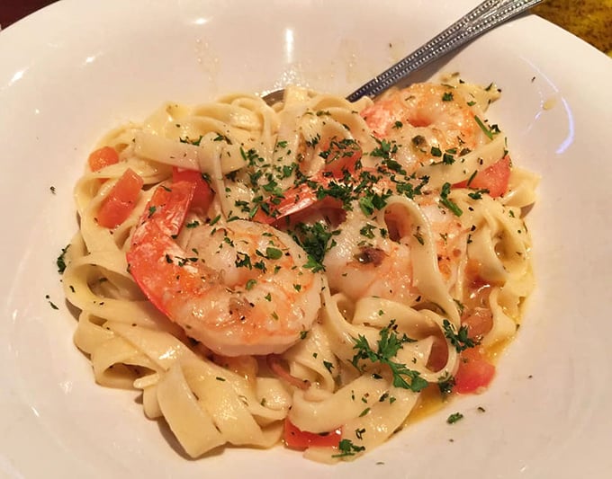 Plump, perfectly sautéed shrimp nestled atop al dente pasta—this Shrimp Scampi isn't just dinner, it's a Mediterranean vacation on a plate.