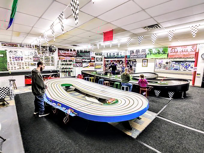 Slot car racing that turns grown adults into gleeful 10-year-olds. The only place where "going in circles" counts as productive weekend entertainment.
