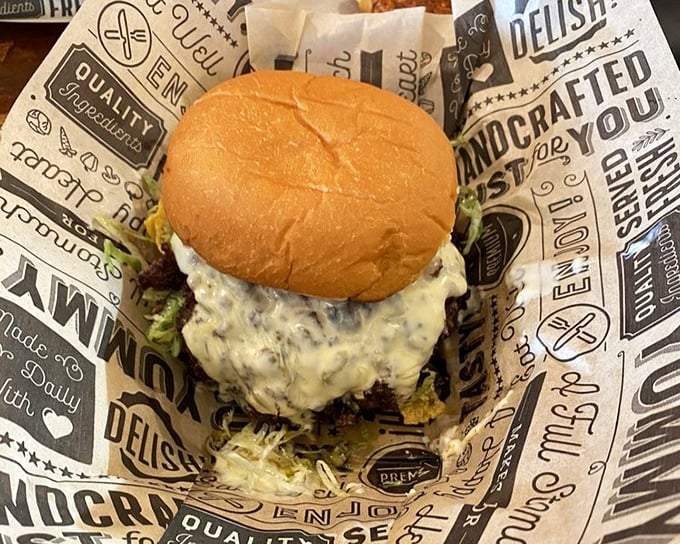 Behold the smash burger in its natural habitat—a perfectly caramelized patty nestled in a soft bun, practically begging to be devoured.