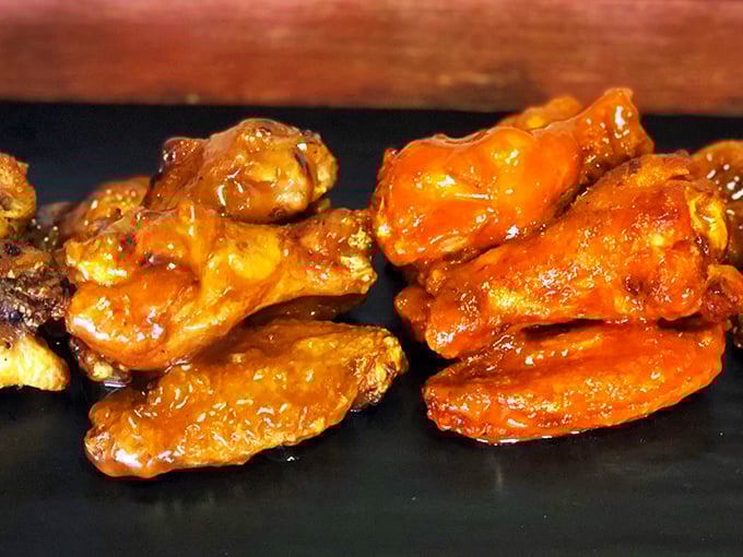 These wings aren't just sauced – they're transformed. Two different flavor journeys waiting to happen, glistening with promise and worthy of your undivided attention.