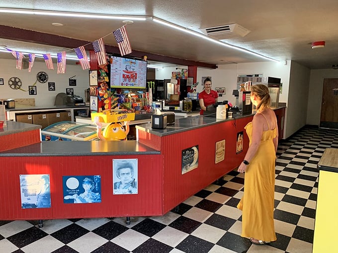 The concession stand's classic black-and-white checkered floor sets the stage for intermission adventures and snack quests.