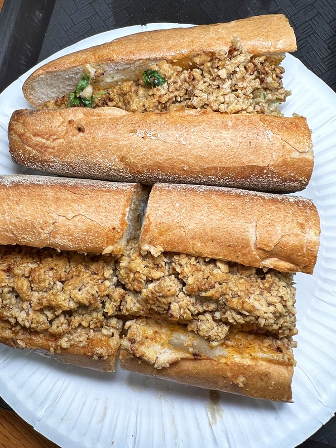 Behold the star attraction: chicken cheesesteaks chopped to perfection, seasoned with what can only be described as Philadelphia magic.