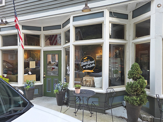 Window shopping, old-school style. State Street's charming storefronts invite passersby to slow down and remember when browsing wasn't done with thumbs.
