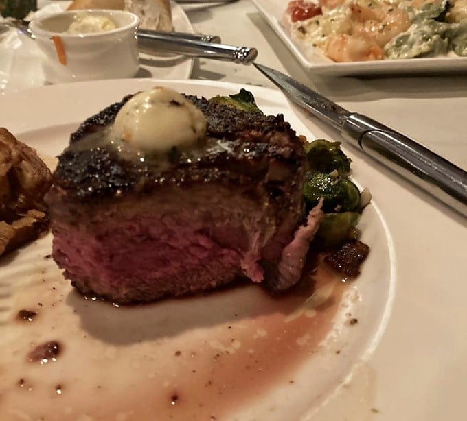 This isn't just a steak—it's a masterpiece of meat. Perfectly seared exterior, melt-in-your-mouth interior, and that butter melting on top? Pure bliss.