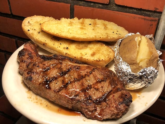 This isn't just a steak—it's a trophy of personal achievement. The grill marks tell the story of your culinary prowess at the communal cooking station.