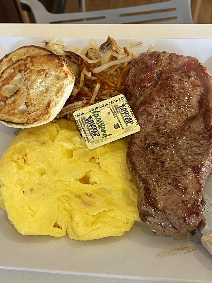 The holy trinity of breakfast: perfectly seared steak, fluffy scrambled eggs, and crispy potatoes. Carnivore poetry on a plate.