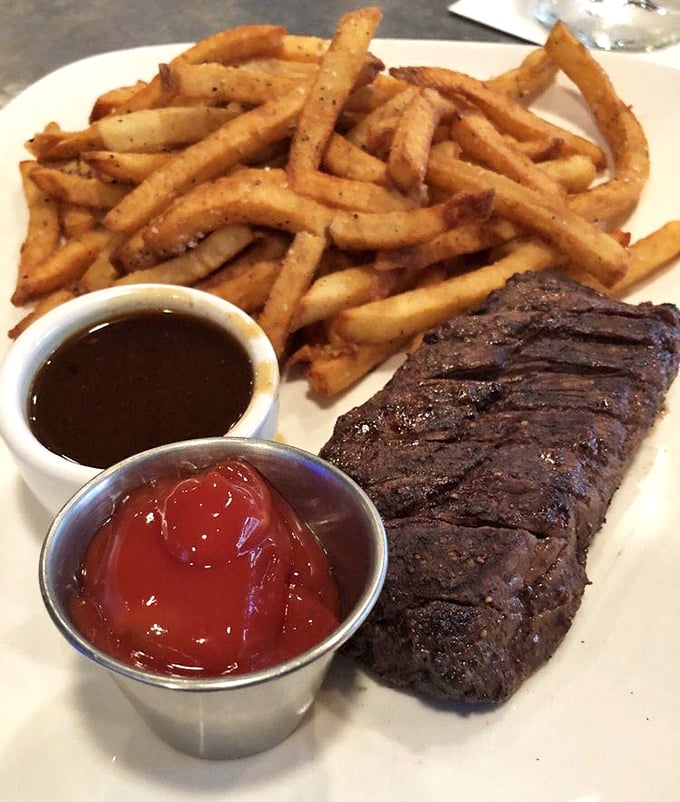 Steak frites that would make a Parisian weep with joy – perfectly seared beef alongside fries that deserve their own fan club.
