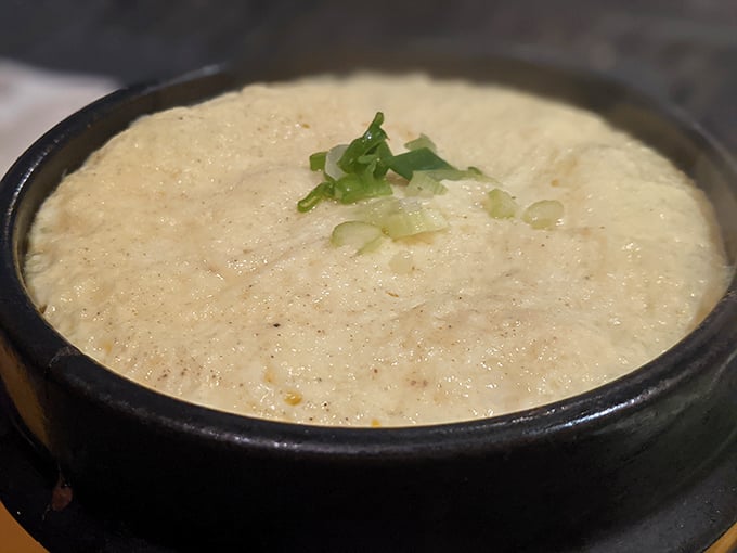 Behold the steamed egg—a cloud-like creation that somehow manages to be both impossibly fluffy and custardy at once. Simplicity, perfected.