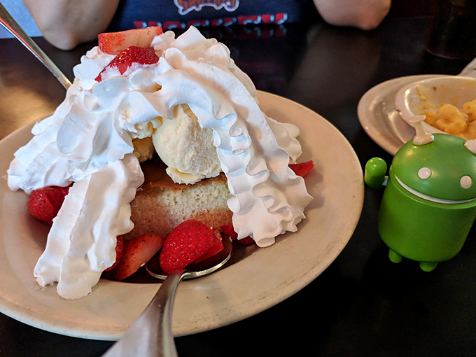 This strawberry shortcake isn't just dessert—it's an architectural marvel of fresh berries, proper shortcake, and whipped cream that defies gravity.