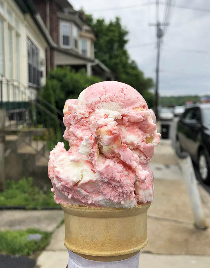 Not just strawberry ice cream—it's summer captured in a cone, with chunks of real berries playing hide-and-seek in every lick.