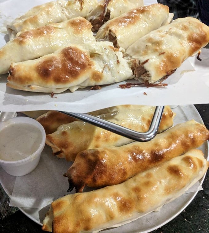 Behold the breadstick in its natural glory! Golden-brown on the outside, molten cheese paradise on the inside. This isn't food—it's an experience wrapped in dough.