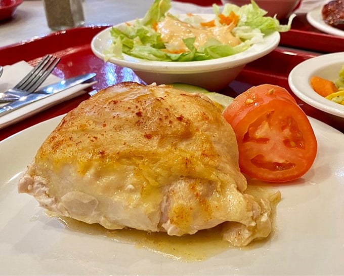 Behold the star attraction—the stuffed chicken breast that's inspired road trips and family traditions. That golden-brown exterior is just the beginning of the magic.