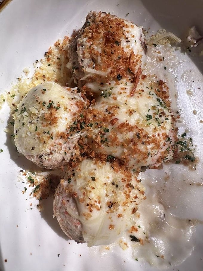 These aren't just stuffed mushrooms—they're little umami bombs of happiness that might make you forget your table manners as you reach for seconds.