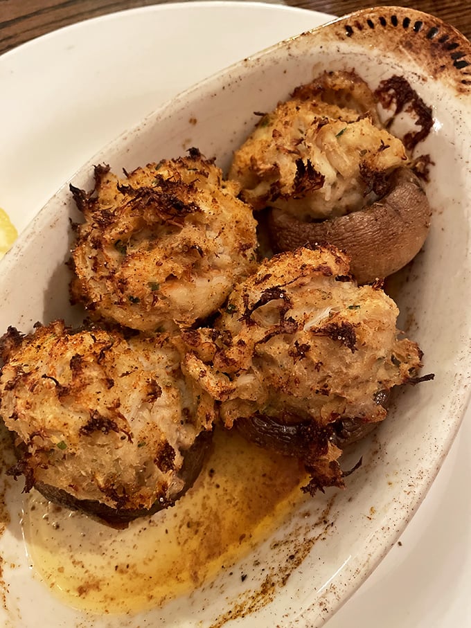 These stuffed mushrooms aren't just appetizers—they're little flavor bombs packed with crab imperial that might make you forget your table manners.