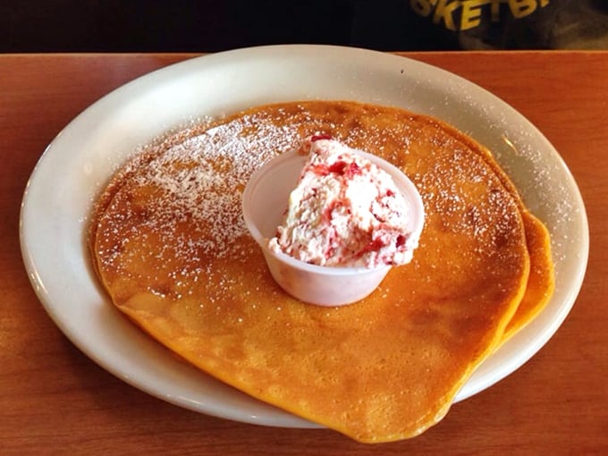 Swedish pancakes so thin and golden they practically whisper "eat me" – that lingonberry cream is the stuff breakfast dreams are made of.