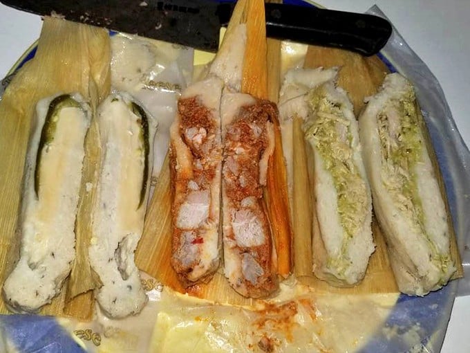 Behold the holy trinity of tamale perfection – each corn husk wrapper hiding pure culinary gold inside.