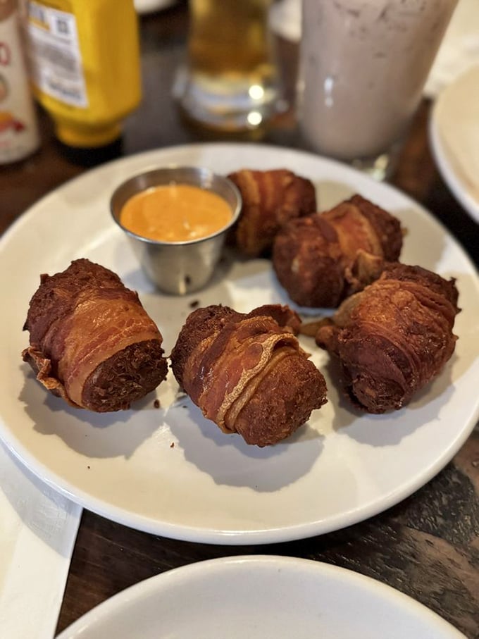 These bacon-wrapped tater tots aren't just appetizers—they're little bundles of joy that make you question why all potatoes aren't treated with such reverence.
