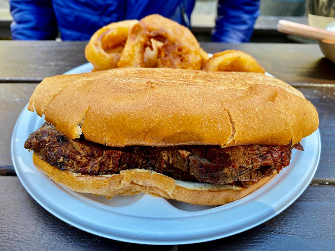 Simplicity perfected: This tri-tip sandwich doesn't need fancy garnishes—just perfectly smoked beef on a fresh roll, ready to make your taste buds stand at attention.