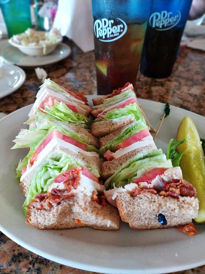 Behold the architectural marvel that is Rossi's turkey club – perfectly stacked layers that would make Frank Lloyd Wright jealous.
