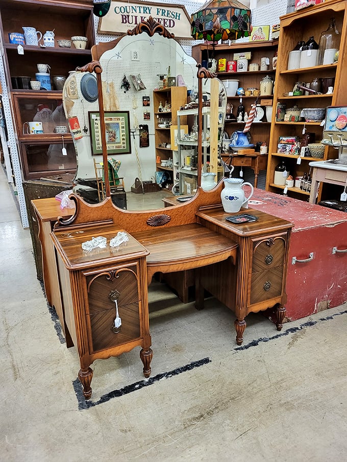 This isn't just a vanity—it's a piece of craftsmanship from when furniture was built to outlast its owners. Mirror, mirror on the wall…