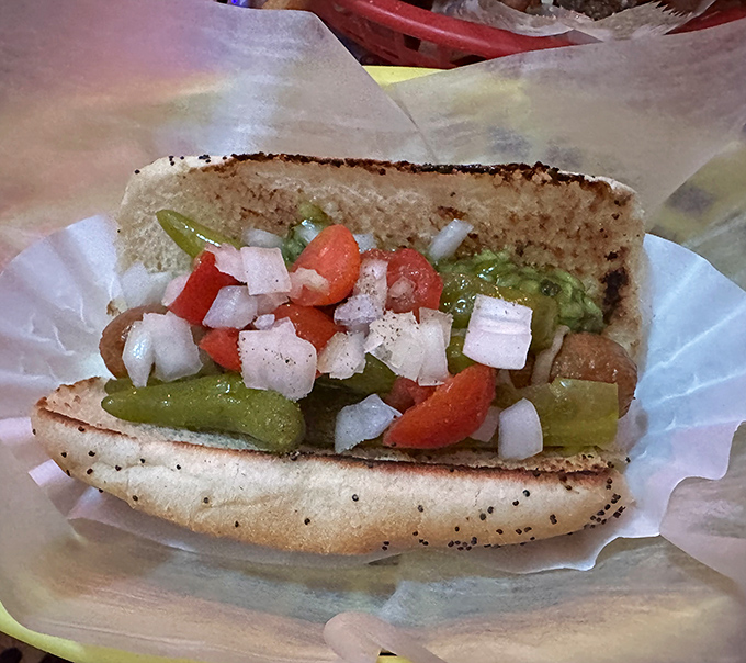 This Chicago-style beauty isn't just a hot dog—it's a garden party in a bun. Those fresh veggies add a crunch that makes your taste buds stand up and applaud.