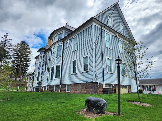 The Victorian House Museum isn't just blue—it's the kind of blue that makes you wonder if Victorian paint catalogs had colors named "Wistful Memories" or "Grandmother's Teacup."