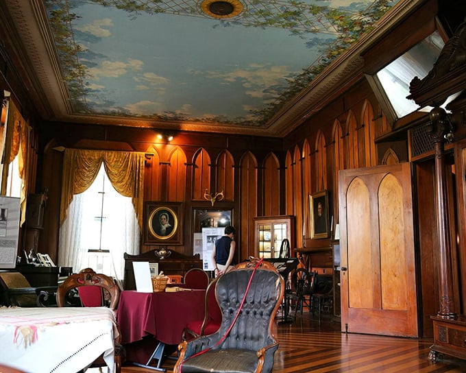 Step into this wood-paneled parlor with its painted ceiling and feel like you've crashed a 19th-century gathering where important decisions were made over brandy.