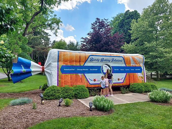 Honey, I shrunk the humans! Families find the perfect photo op beside this supersized sandwich starter, creating memories that rise above the ordinary.