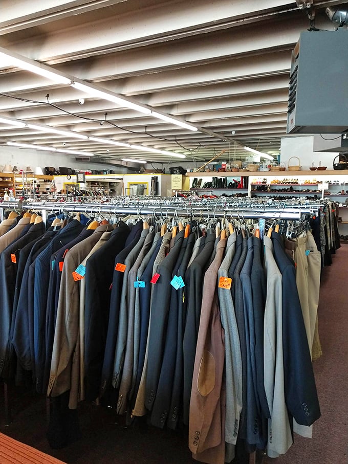 The men's section: where yesterday's power suits await their second act, each colorful tag a promise of style at a fraction of retail.