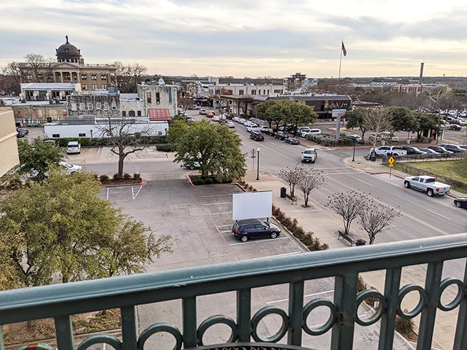 From this bird's-eye view, Georgetown reveals its perfect balance—historic courthouse standing proud while life unfolds in the streets below like a Texas-sized snow globe.