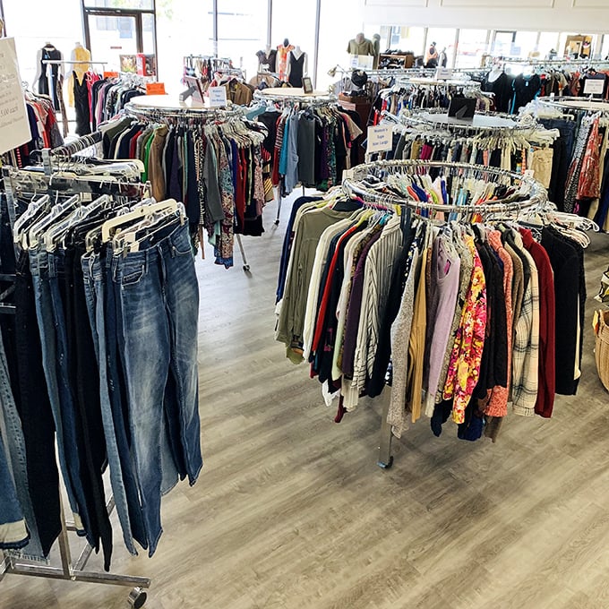 Circular racks organized by type and color—a rarity in thrift world. No archaeological expedition required to find your size!