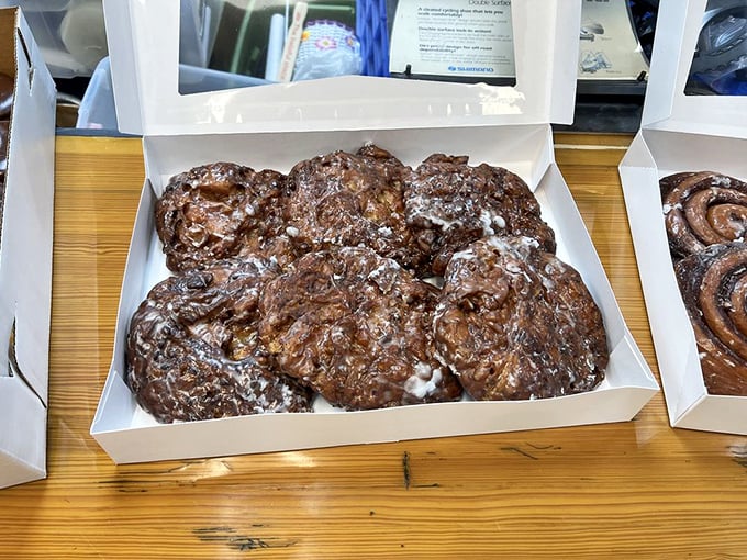 These apple fritters aren't just donuts—they're architectural marvels of caramelized edges and apple-studded interiors. Worth every calorie!