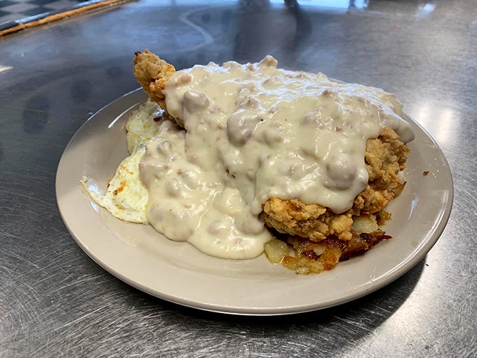Behold the star attraction – biscuits smothered in creamy, peppery gravy that would make your grandmother both jealous and proud at the same time.