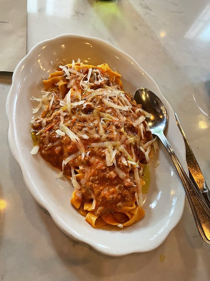 The pappardelle with heritage pork ragu isn't just pasta—it's a slow-simmered Italian hug on a plate that makes you want to kiss your fingertips.