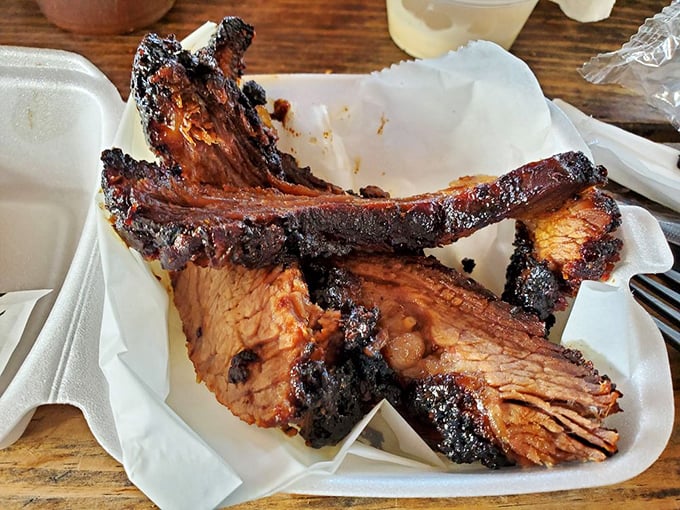Behold, brisket nirvana. That bark, that smoke ring, that pull-apart tenderness—this isn't just dinner, it's a religious experience with a side of paper towels.