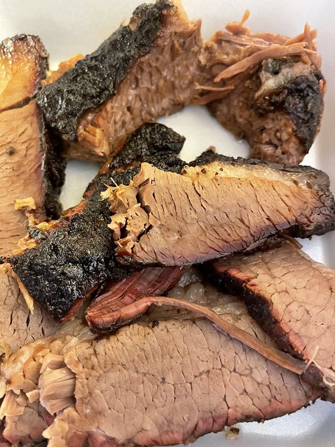 Brisket that doesn't just fall apart – it surrenders. That smoke ring is the barbecue equivalent of a Michelin star.