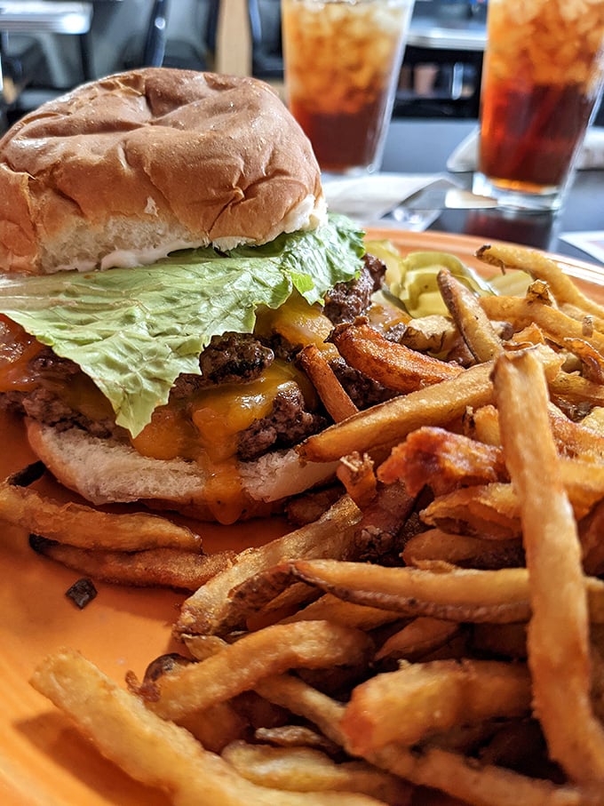 The cheeseburger and fries at Nick's don't need Instagram filters—they're the real deal. Crispy, golden fries flanking a burger that puts fast food chains to shame.